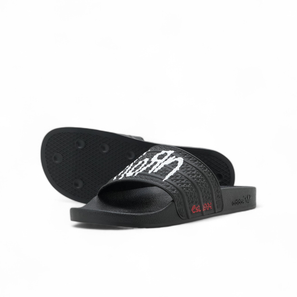adidas KORN × ADILETTE SLIDE "BLACK FOOTWEAR WHITE BETTER SCARLET ...