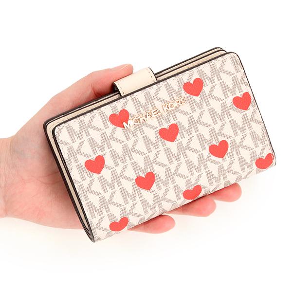 型番：35R6GTVF8I2605ブランド：マイケル・コース商品名：JET SET TRAVEL MD BIFLD ZP CN WLLET ウォレットカラー：ライトクリーム　マルチ