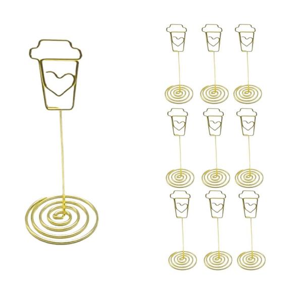 10個セットの金属製メモクリップホルダーです。名刺や写真、テーブル番号カードなどを挿して表示できるデスク用スタンドです。素材は鉄、カラーはゴールドです。簡易フレームが付いており、卓上フォトフレームやディスプレイ台としても使用できます。会議室...