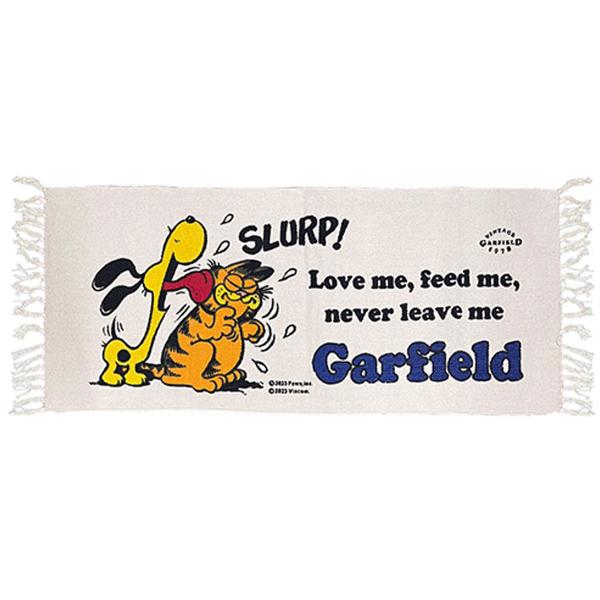 アメリカンキャラクターのGARFIELDそんな可愛い？おとぼけ？猫のコットンキッチンマットです。しっかりした生地のコットン100％ 汚れても丸洗い可能なのでキッチンだけでなく、、玄関、浴室、洗面所と使い勝手が良いです！マットの端はフリンジ仕...