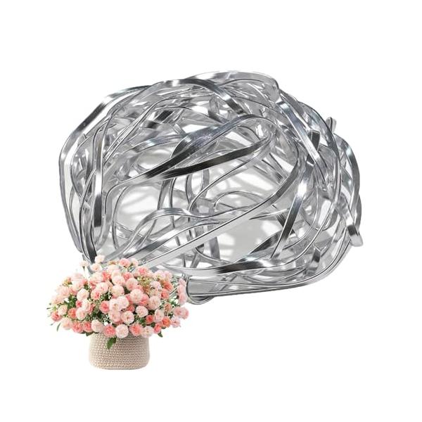 セット内容 鶴の巣花留*1(シルバー) 伝統と機能性の融合 この鶴の巣花留は、伝統的な生け花の技法を現代の生活に取り入れたデザインです。剣山としての機能性を保ちつつ、鶴の巣をモチーフにしたユニークな形状が、花器の中に自然な美しさを添えます。...