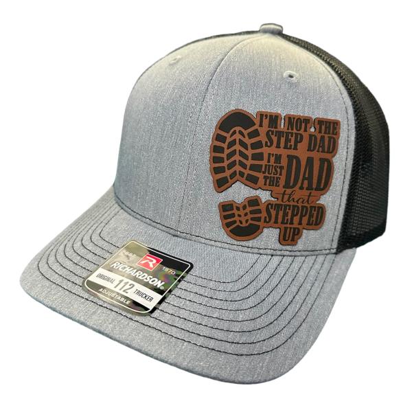商品名:  I'm Not The Step Dad I'm Just The Dad That Stepped Up Leather Patch Trucker Snapback Baseball Cap - HeatherGray/Bl...