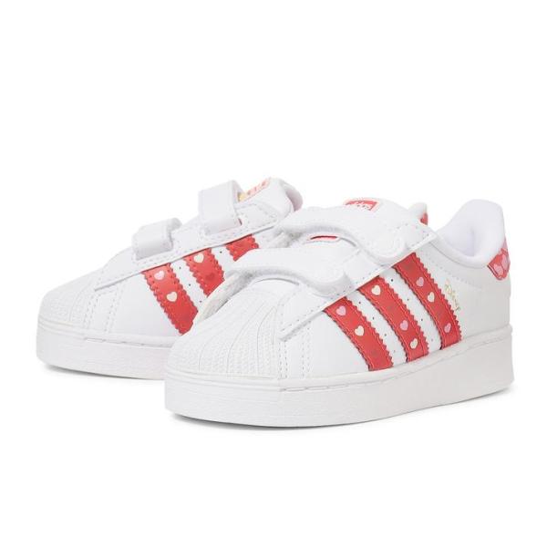 足元を明るく照らすアディダス ディズニー スーパースター LED ライト コンフォート クロージャー スニーカー。1990年代から2000年代のアイコニックなスタイルに着想を得たこの一足は、ディズニーの魔法のようなきらめきを子どもの日常に添...