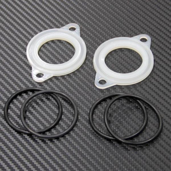 WEBER 40DCOEやDELLORT 40DHLA用のキャブレター取付インシュレーターセット。プラスチックプレートとO-リングでキャブレターをフローティングマウントし、マニホールドからの熱や振動を伝えにくくします。ツインチョークキャブレ...