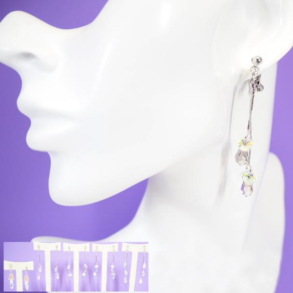 ピアスではありません。イヤリングです。クリスタルガラスです。ぶつけたりすると割れる事ありますのでもご注意ください。セールスポイント（１）大き目のひし形オーロラ、華やかです。（２）フォーマル、パーティー。結婚式　特にお薦めです。商品説明（１）...