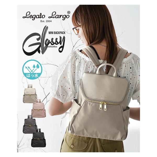 【カラー】ブラック/グレーベージュ/グレー/ピンク 【素材】材質＝ポリエステル・合成皮革　サイズ＝たて約30×よこ（上部）約23（底部）約26×まち幅約9cm　開閉＝ファスナー　ポケット＝中：2個（オープン2）外：2個（オープン2）　ハンド...