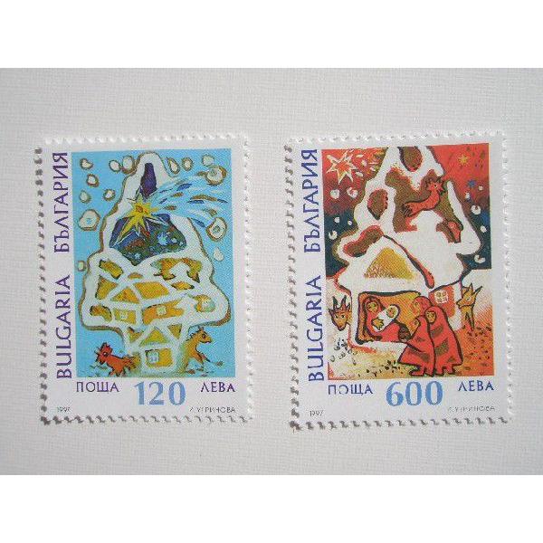 1997年発行のブルガリアの切手「クリスマス1997」です。120lv.:ベツレヘムの星600lv.:聖母マリアとキリストいずれもフォークロア風のイラストです。2枚組　 1997年12月8日発行　3cm x 4cmデザイン：I. ウグリノヴ...