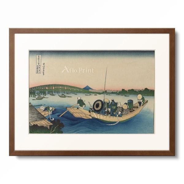 Hokusai Katsushika, 1760-1849.Print shows a man poling a ferry boat full of passengers across the Sumida River, with vie...