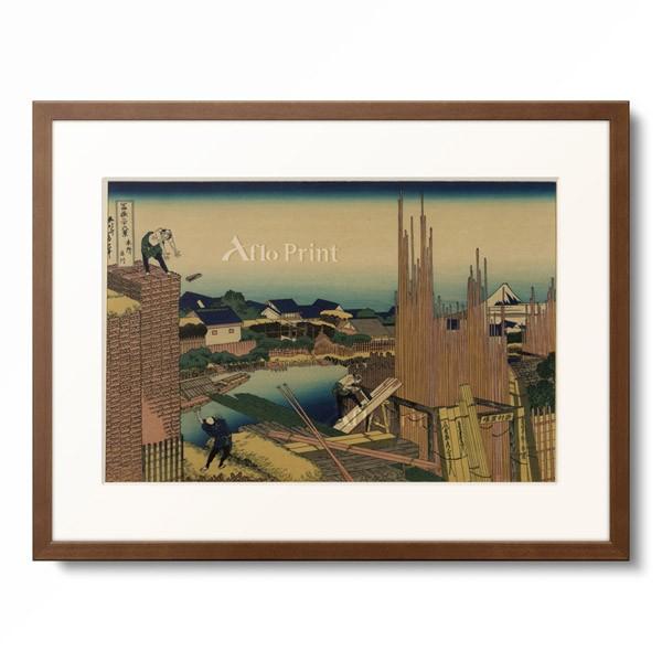 Hokusai Katsushika, 1760-1849.Print shows a man sawing a large piece of wood to make boards and two men removing tiles (...