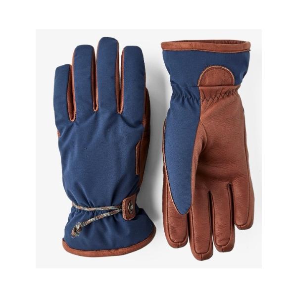 手の甲にナイロン生地、手のひらに加工牛革を使用し、耐候性と耐久性に優れながらも柔軟な着用感を実現しています。ライナーには起毛フリース、中綿には高い保温性と防湿性で定評のあるPrimaloft Goldを採用。さらに、防水透湿性に優れたCZo...