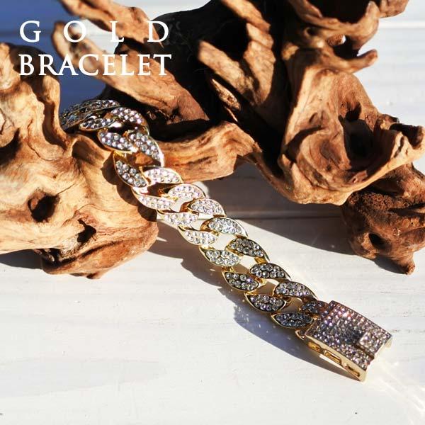 キラキラとゴージャス感のあるおしゃれなブレスレットです！ずっしりと重くかっこいいデザインです。チェーン幅が太く、目立つこと間違いなし！マイアミキューバンで、存在感があります。■チェーンカラー：ゴールド■実寸サイズ全長：約21m(留め具含む)...