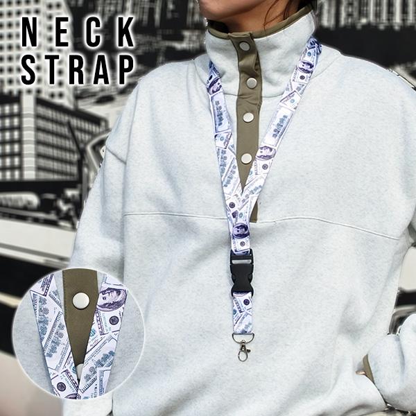 $100紙幣のおしゃれなネックストラップ新入荷！存在感のあるデザインでファッションのワンポイントにもピッタリ。先端は取り外し可能なので自由度UP！■サイズ全長約58cm(金具含む)　首回り約84cm　紐幅約2.5cm※ネコポス便OK※この商...