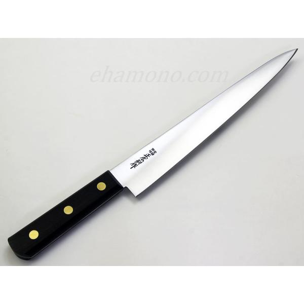 刃長240mm、全国のお肉屋さんで最もよく使われている筋引き包丁です。軽くて使いやすく、切れ味はバツグン！正広特製の炭素綱（さびる鋼）を使用していますが、常に使っておられる場合は、肉の脂がつく事もあり、わりと錆びにくいのもこの包丁の特長です...