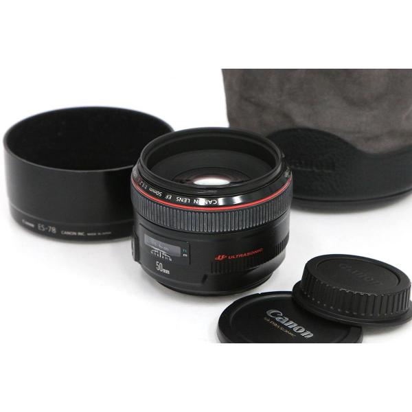 ■商品名キヤノン EF50mm F1.2L USM■状態並品[外観]全体的に使用に伴うスレや傷があります。フロントキャップ裏にシールが貼ってあります。[光学]チリの混入はありますがくもりやカビなどは無く実用的な状態です。[動作]基本動作に異...