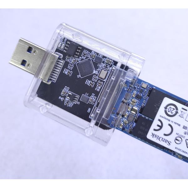 USB（オス）ー  M.2（メス）　変換アダプタUSB3.0対応 SATA用載せ替え等で余ったM.2 SATA SSDを手軽にUSBメモリ化ケースが無い、剥き出しのため脱着が速い！ロック機構は無いため動作中に触れてはいけませんが、そのリスク...