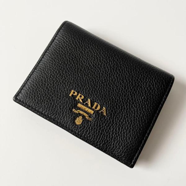■商品情報【管理番号】686【ブランド】PRADA/プラダ【アイテム】二つ折り財布【型番】1MV204【対象】レディース【表記カラー】ブラック【カラー】ブラック【金具色】ゴールド【素材】レザー【サイズ】W約11cm x H約9cm x D約...
