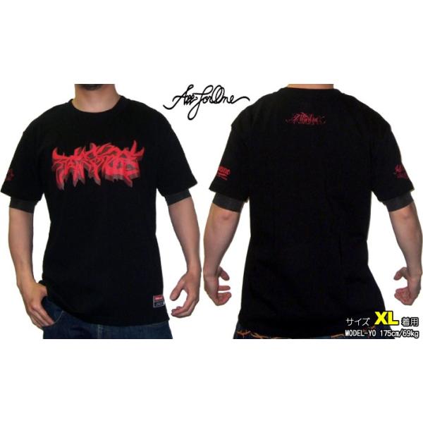 グラフィック ティーシャツ【素材】コットン 100％ 【備考】画像サイズ ：XL 着用6.2oz Teeサイズ :着丈/身幅/袖丈(cm)XS:57/42/15S:63/47/18M:68/52/22L:72/55/22XL:75/60/2...