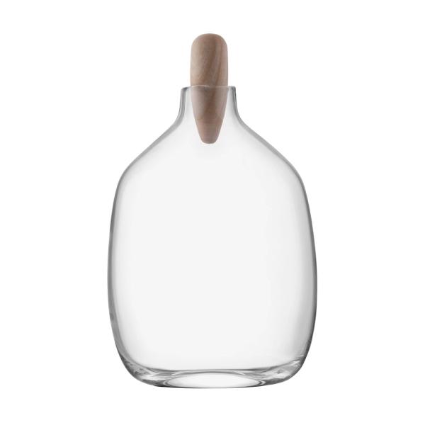 コンテンポラリーなテイストの、瓶を思わせるハンドメイドのガラスデカンタです。FSC森林認証を受けたアッシュ材の細長い卵型ストッパーが付いています。丈夫なウッド製ストッパーはデカンタのネックに浮かんでいるかのようです。 ※本商品は職人さんの手...