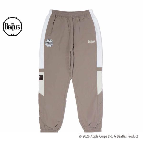 ◇TIGORA×THE BEATLES コラボレーション アンセムパンツ。◇ビンテージデザインにルーズなシルエットのアンセムパンツです。メッシュの裏地付きでウォームアップや寒い時期のトレーニングだけでなく、移動着や普段着としても使える1枚で...