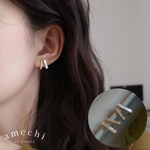ホワイトとジルコニアのラインバーがおしゃれな重ね付け風イヤリング。上品で女性らしいデザインは、デイリーからオケージョンまで幅広く活躍してくれます。タイプ：イヤリングカラー：ゴールドサイズ：縦 約1.2cm × 横 約0.8cm重さ：約1.2...