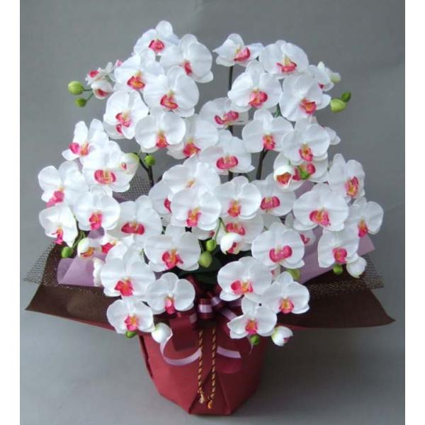 光触媒のコーティングで、除菌・消臭作用もある造花の胡蝶蘭。水やり不要で枯れない造花は、手間がかからない為、開店祝い・開業祝い・開院祝い・移転祝い・新築祝いなど、また、誕生日プレゼントや就任祝いにも人気です。また、温度に関係なく配送ができるの...