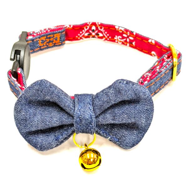 岡野製作所　デニムリボンキャット ネイビーおしゃれなデニムの肌にやさしいコットン製生地を使用した、大きなリボン付きの猫用首輪です。負荷がかかると外れるセーフティバックルタイプ。万が一枝などに首輪が引っかかっても、バックルが外れるので安心です...