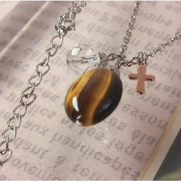 タイガーズアイ：オーバル型　　　　　　　　　約1.3cmＸ1.8cm水晶：64面カット 8mm 十字架：金色 約5mmX10mm　　　チェーン：アジャスター付き約50cm〜55cm (短めチェーン：約40cm〜47cmへの変更をご希望の方は...