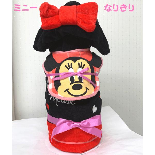 人気のディズニーのミニーなりきりタオルがついたおむつケーキです!!ご出産祝いにもピッタリ♪ なりきりタオル＋スタイがついてます♪※スタイは名前入れ無料です。【おむつケーキのセット内容】○なりきりタオル　約60cm×約120cm超かわいいフー...