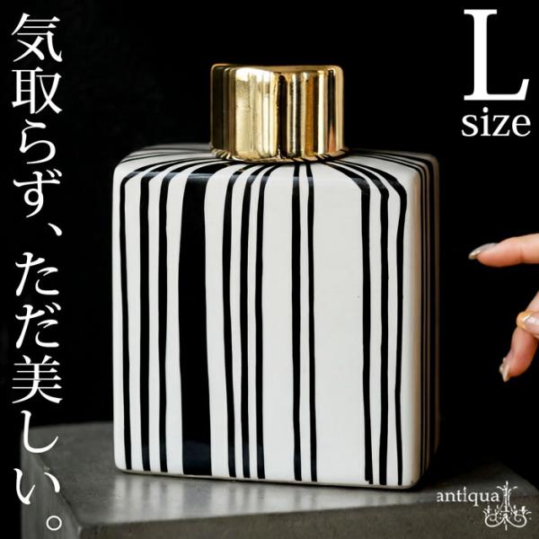 ×メール便不可！※詳細をPCサイトよりご購入前にご確認下さいませ。モノトーンストライプの陶器キャニスターにゴールド蓋を配した存在感あるインテリア雑貨。置くだけで空間の印象を変えるデザイン性と、実用的な小物入れとしての機能を兼ね備えています。