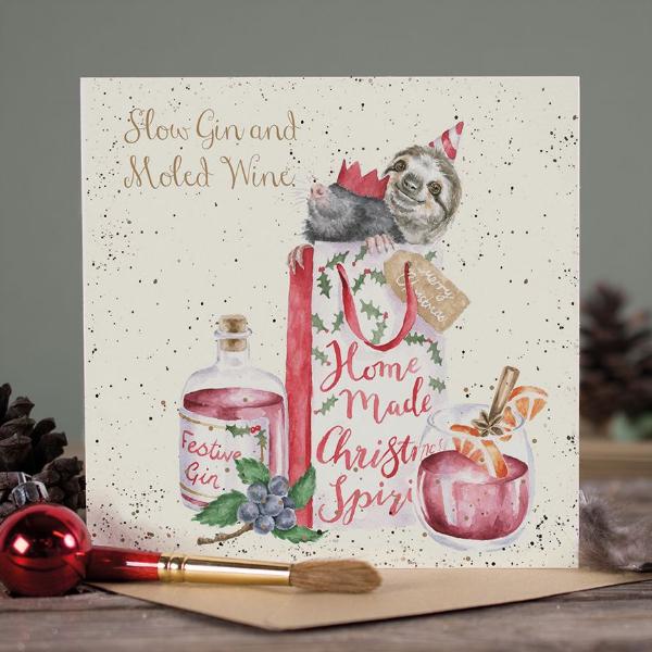 "Slow Gin and Moled Wine"（スロージンとモルドワイン）表紙に金箔押し加工の文字が入った、美しい動物イラストのクリスマスカードです。本来のスペルは"Sloe Gin and Mulled Wine"だが、ナマケモノの"...