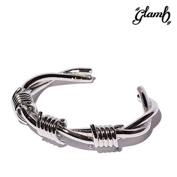 glamb グラム●商品説明有刺鉄線をモチーフに再構築したBarbed Wire Half Bangle。無骨なワイヤーワークをベースにしながらも、滑らかな曲線と程よいボリュームで仕上げることで、ハードな印象に洗練されたニュアンスを添えまし...