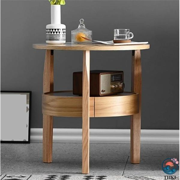 素朴な魅力とモダンな機能性を融合させた隠し引き出し付きのラウンドオークウッドコーヒーテーブルで、リビングスペースを充実させましょう。 オーク材で作られたこのコーヒーテーブルは、一般的なトゥーンウッドや人工木材の代替品と比較して、優れた強度と...