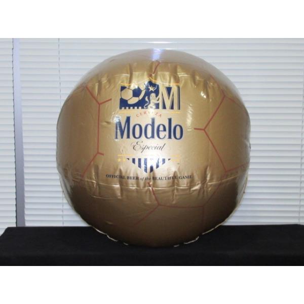 MODELOビール サッカーボールタイプ　バルーン　新品　　サイズ約48×48cm　上部に吊り下げるためのフック付き(画像参照）リビングやガレージ、ダイナーやバーなどのディスプレイにも！　新品ですが検品の為に１度エアーを入れてある場合もあり...
