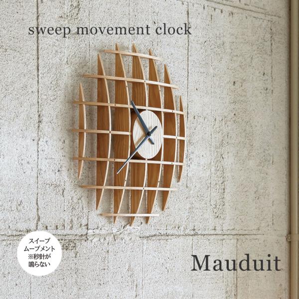 木組み建築のような立体感とインパクトのあるデザインが魅力の壁掛け時計。やわらかなカーブを描く木の板を格子状に組み上げ、丁寧に作られています。数字のない文字盤は家具との馴染もよく、大きめサイズでも圧迫感を与えません。※壁掛け用木ネジ付。単三電...