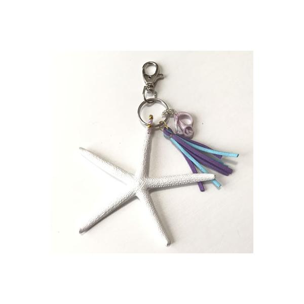 シェルとタッセルがついたヒトデのキーホルダー♪ ナチュラルな雰囲気♪のハワイアン雑貨で楽しいリゾートライフを〜♪オーナメントとして窓際や玄関・車内に飾ってリゾートライフを楽しみましょう！ サイズ：高さ：約17cm、幅：約11cm、ヒトデ：約...