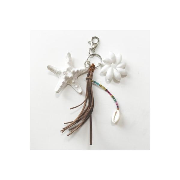コブヒトデとバブルシェルのキーホルダー♪ ナチュラルな雰囲気のハワイアン雑貨で楽しいリゾートライフを〜♪オーナメントとして窓際や玄関・車内に飾ってリゾートライフを楽しみましょう！サイズ：高さ：約18cm、幅：約7.5cm、ヒトデ：約7.5c...