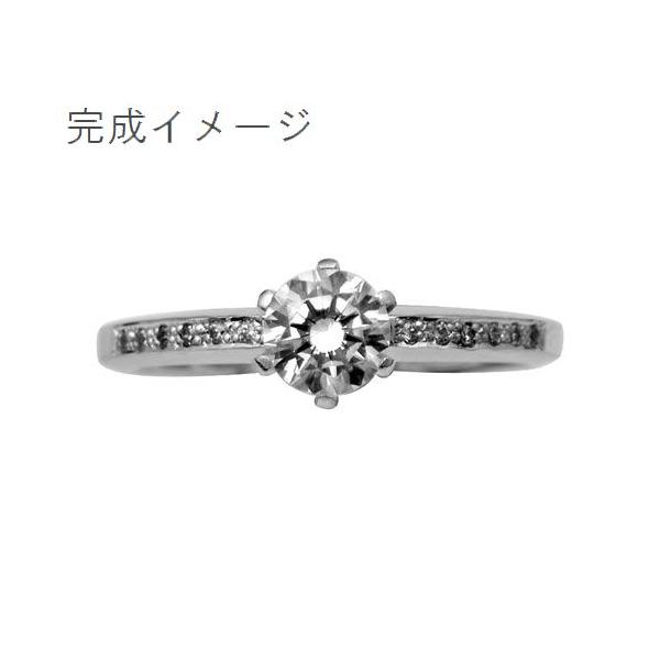 華奢なメレダイヤ入り腕が 、メイン石を引き立てるデザイン＊ラウンドカット宝石用リング枠です。＊写真は完成制作例です。中央の宝石はお客様お手持ちのものを使用します。＊価格はメレダイヤ入りプラチナ９００リング枠と石留め加工、サイズ合わせを含んだ...