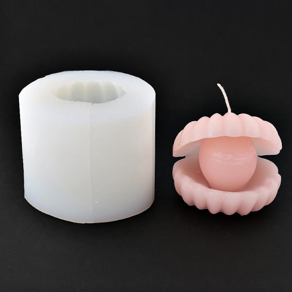 可愛いらしい大きなパールシェルが作れるシリコンモールドです。アロマキャンドルやソープ型などにおススメです。キャンドル芯を通すための穴と上から下までの切れ込みが元々入っています。切れ込みはまっすぐではなく、歪み・ガタツキがありますが、元からの...