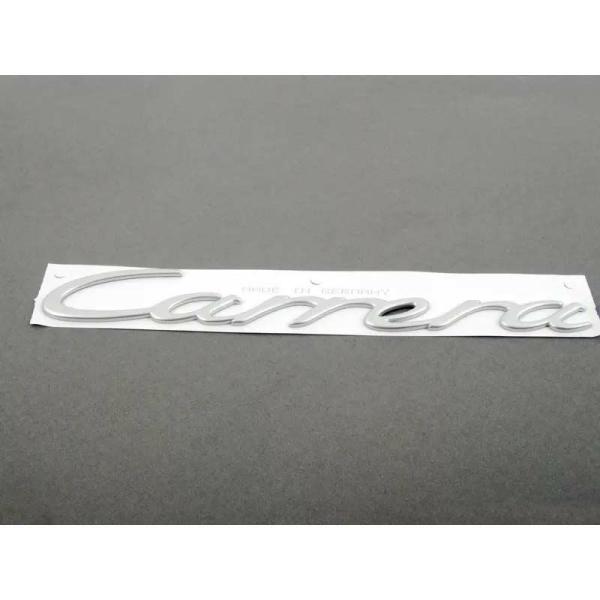 ポルシェ純正のリア・エンブレムです。エンブレムデザインは”Carrera”。オリジナルでは、ポルシェ 997型911のカレラSとカレラ4Sに取り付けられていました。
