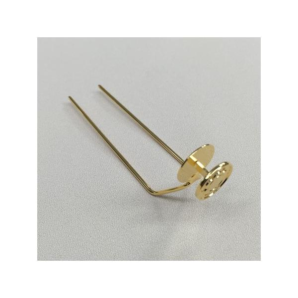 くしストッパー　【くし止め】くしをかつらに固定する金具です。