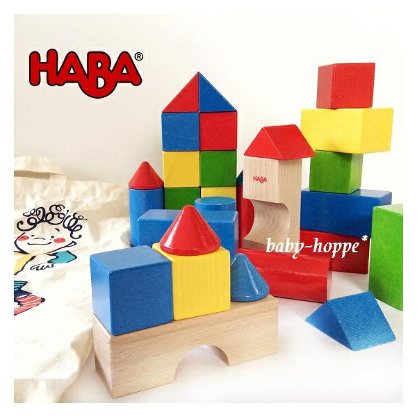 しっかりした塗りの、触り心地のよいつみきです。鮮やかな色合いは、白木のつみきのアクセントとして使うと、より美しい素敵な作品に出来上がります。もちろんなめても安全な塗料です。子供が自分でお片づけのしやすい布袋収納となります。メーカー：ドイツ/...