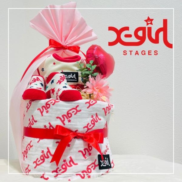 【X-girl】おむつケーキは、初めてのお祝いにぴったりな特別なギフトです！可愛らしいデザインと実用性を兼ね備えたおむつケーキは、出産祝いとして新米ママを感動させるアイテムです。おむつの他にも、赤ちゃんの成長を支えるアイテムが詰まっています...