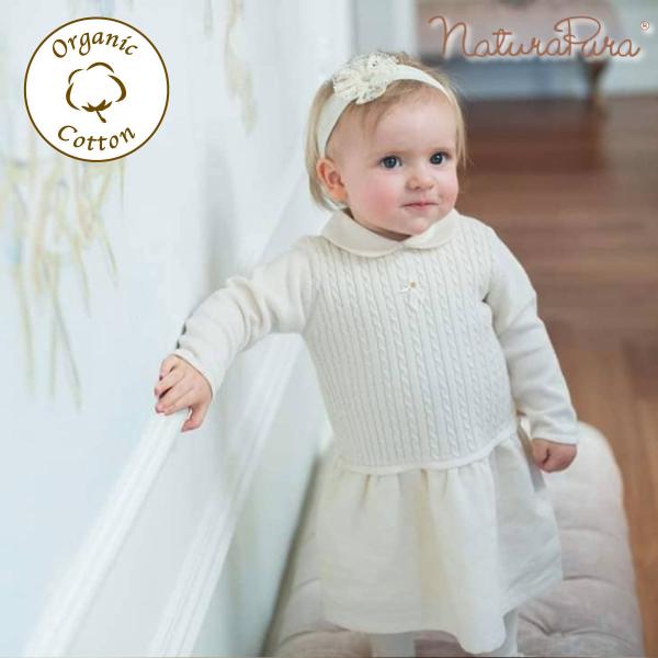 高品質のオーガニックコットンで丁寧に作られた襟付きワンピース。ケーブル編みのニットとスカートをドッキングしたおしゃれなデザイン。エレガントで洗練されたデザインは結婚式、お食い初め、ハーフバースデーにも映える自信作です。有害物質を一切使用しな...