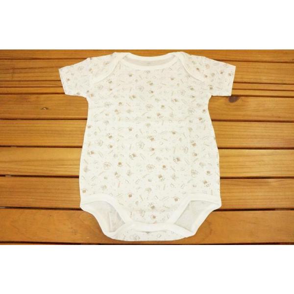 ブランド　Le petit（ル・プチ・モンド・シャルマン）素材　　　フライス　綿100％サイズ　　60/70/80cmcmカラー　　サックス水玉ベースのプリントにパン屋さんをちりばめた楽しい図案ですすっぽりかぶせるタイプのクロスショルダー仕...