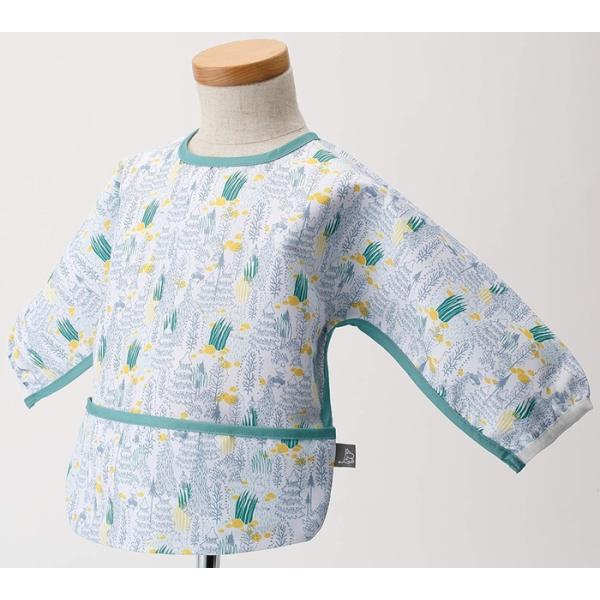 ★ムーミンの総柄ビブ★食べこぼしキャッチポケットつき長袖ビブ 。★ひっくり返すとポケットになるから、　食べこぼしても安心です。★首まわりはマジックテープで調節ができます。★深めのポケット付きで食べこぼしをキャッチ。★汚れたら洗濯機で丸洗いで...