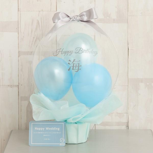 特別な瞬間や空間に、感動と幸せを添えて。ラウンドバルーンポットは、飾る場所を選ばない程よいサイズのデザインで、どんな空間にも調和します。主役であるクリアなバルーンの中には、清潔感のある優しい色合いの異なるブルーを使用。上品なサテンリボンを添...