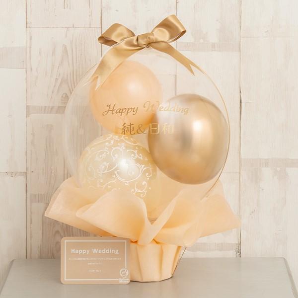 特別な瞬間や空間に、感動と幸せを添えて。ラウンドバルーンポットは、飾る場所を選ばない程よいサイズのデザインで、どんな空間にも調和します。ナチュラルでおしゃれな色合いのヌーディーカラーで全体をまとめゴールドで華やかさをプラスし、飽きのこないデ...