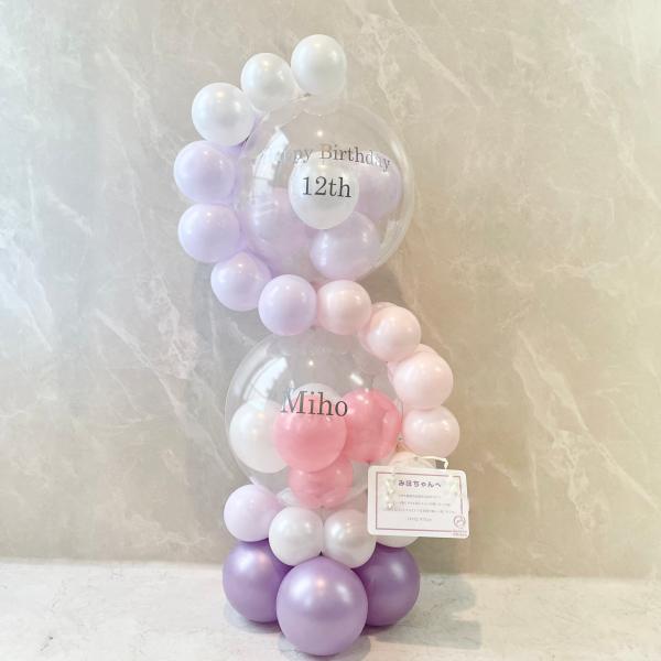 華やかなフラワーブーケを思わせる、上品な方にぴったりのアレンジメントをご用意いたしました。フェミニンなピンクカラーと、品のあるラベンダーカラーのバルーン。さりげなく質感の異なるパール系バルーンを添えることで、かわいらしさはそのままに大人の方...