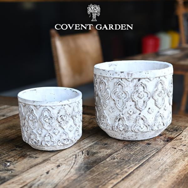 グレーの器に立体的な模様が目を引くオシャレな植木鉢です。素材はセメントでずっしりと重厚感があるので、高級感を感じさせてくれます。全体に擦れや色ムラをつけてアンティーク風に仕上げており、グリーンを優しく引き立てお庭やお部屋になじみます。別々に...