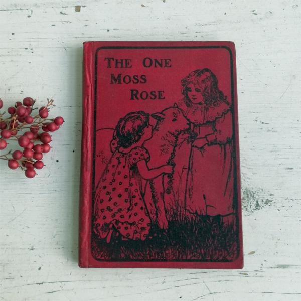 ■size幅=11.3cm　高さ=16.2cm　厚み=1cm全64頁表紙をめくると1906年6月28日に学校から生徒にご褒美として贈られた事が分かる本です。赤と黒のコントラストが印象的で羊に寄り添う少女達の絵が微笑ましいです。角の傷みや頁の...